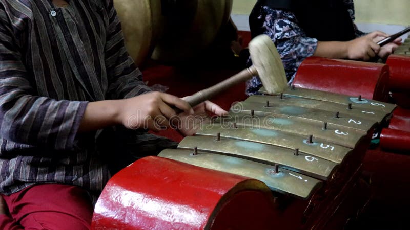 Elementary School Students Practice Playing Gamelan Musical Instruments ...
