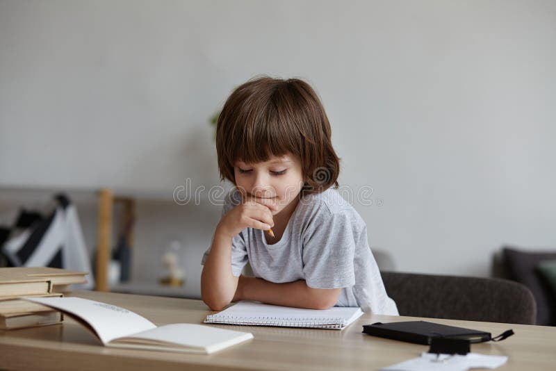 Ementary School Pupil Kid is Thinking Hard about Solving a Problem ...