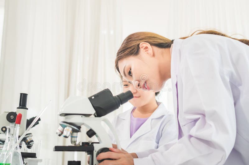 Elementary Science Class, Cheerful Kid Girl with Teacher Scientist in ...