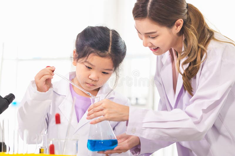 Elementary Science Class, Kid Girl with Teacher Scientist in School ...