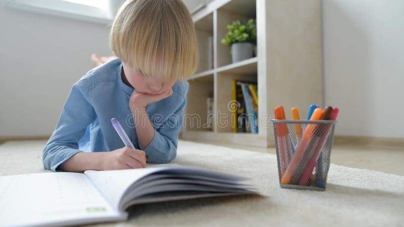 Elementary Student Boy Doing Homework at Home. Child Learning To Count ...