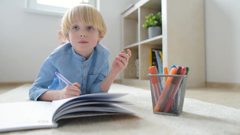 Elementary Student Boy Doing Homework at Home. Child Learning To Count ...