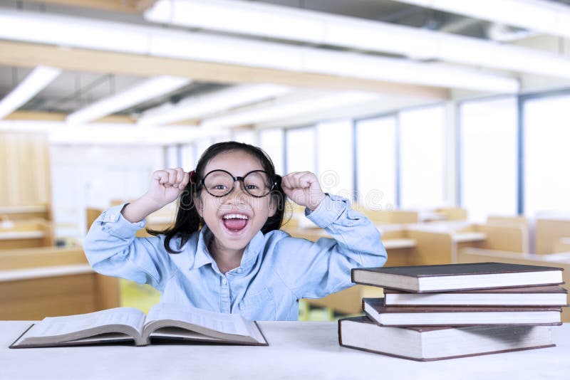 Elementary Student Celebrating Her Success in Classroom Stock Photo ...