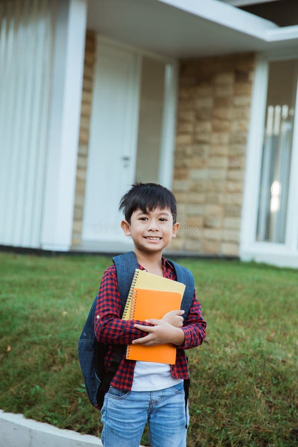 Elementary Student on the Way To His School Standing with Backpack and ...