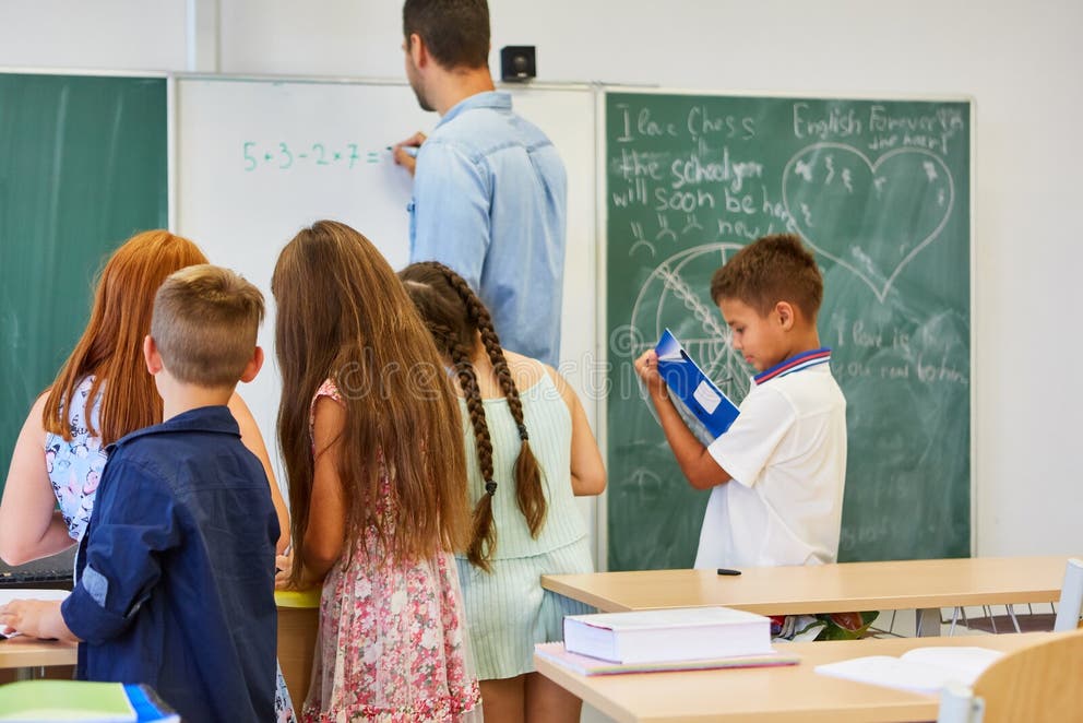 Elementary Students Learning Mathematics in Classroom Stock Image ...