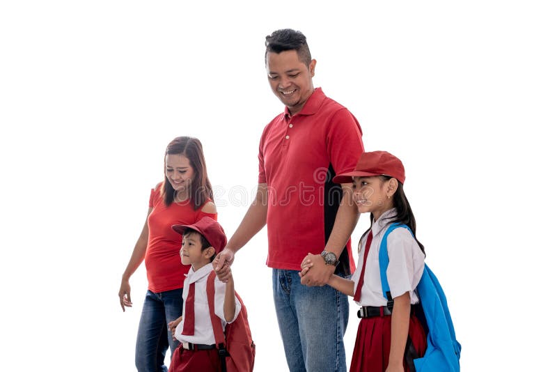 Elementary Students and Parent Walking Together To School Stock Photo ...