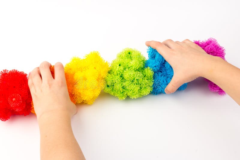 Elements of Children`s Designer of Velcro in Kid Hands, on White ...