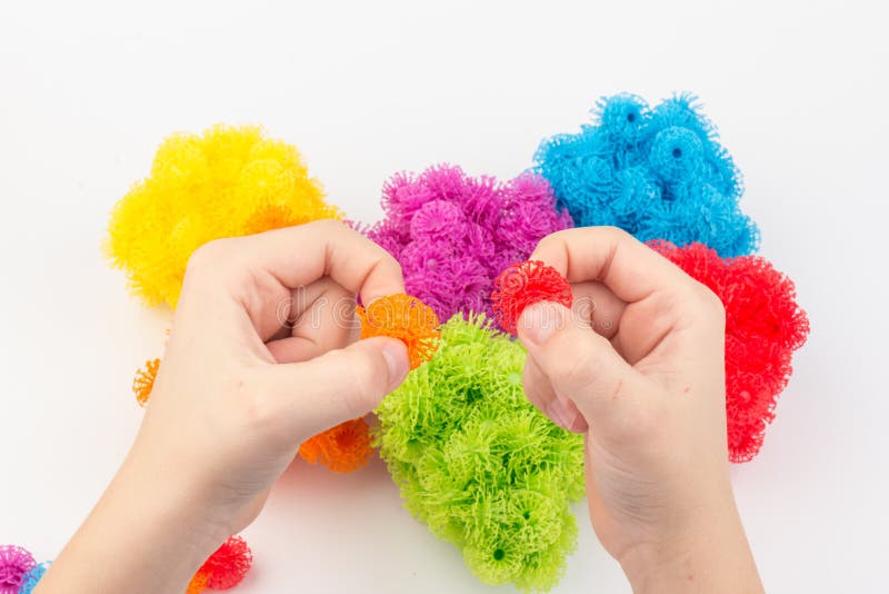 Elements of Children`s Designer of Velcro in Kid Hands,isolated on ...