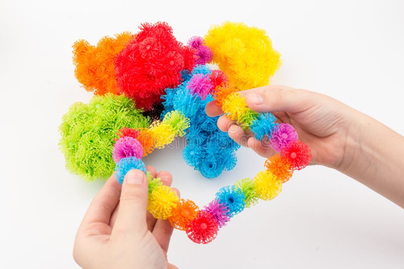 Elements of Children`s Designer of Velcro in Kid Hands,isolated on ...