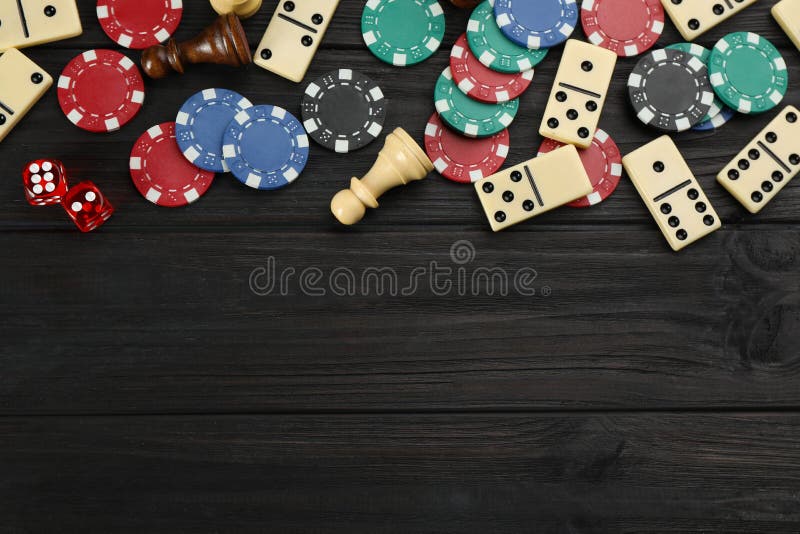 Elements of Different Board Games on Dark Wooden Table, Flat Lay. Space ...
