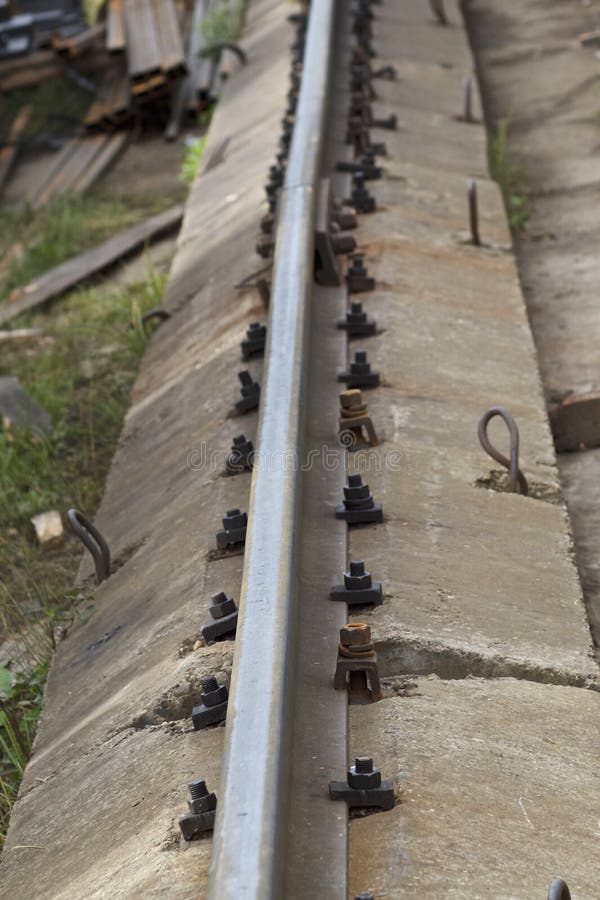 Fastening a Rail To a Railroad Tie Closeup Stock Photo - Image of metal ...
