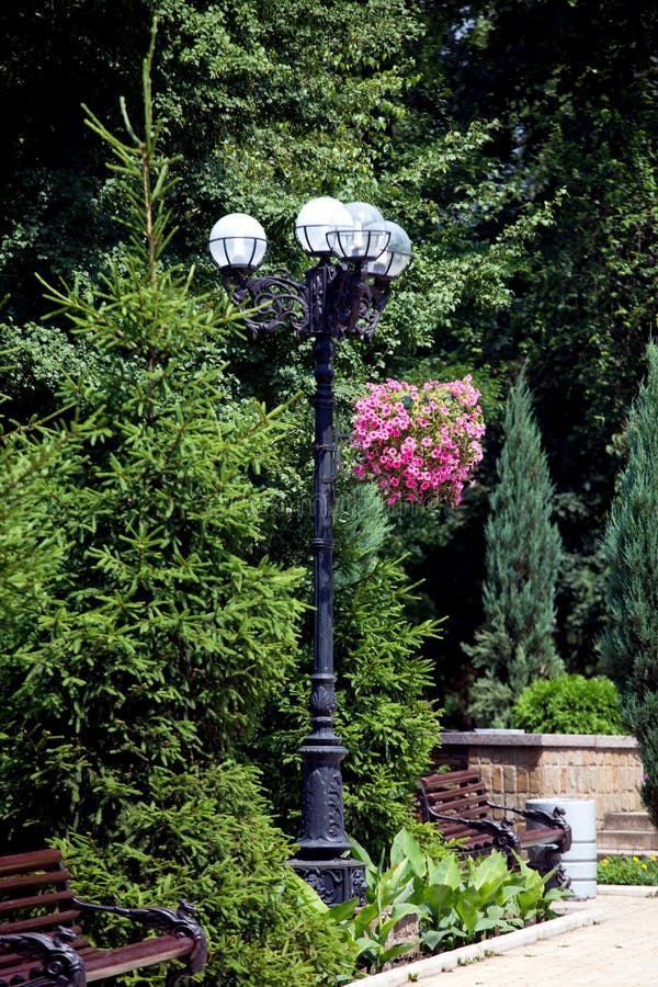 Elements of Park Infrastructure, Iron Lamp Post with Flower Pot Stock ...