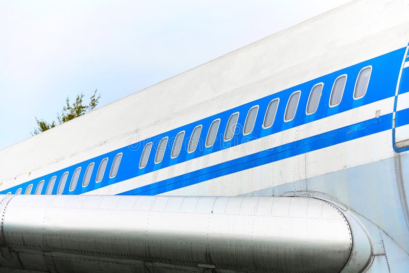 Elements of a Passenger Plane with a Blue Stripe Closeup Stock Image ...