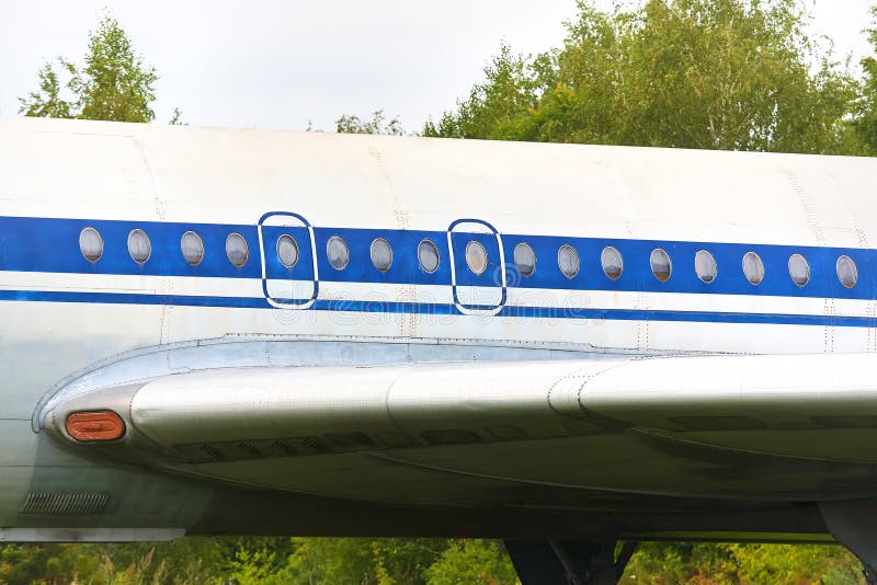 Elements of a Passenger Plane with a Blue Stripe Closeup Stock Image ...