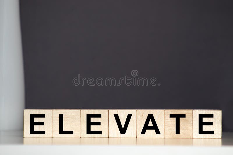 Elevate Word Written on Wood Block, Business Concept. Stock Photo ...