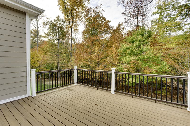 Elevated Deck Overlooking Trees in Serene Setting Stock Image - Image ...