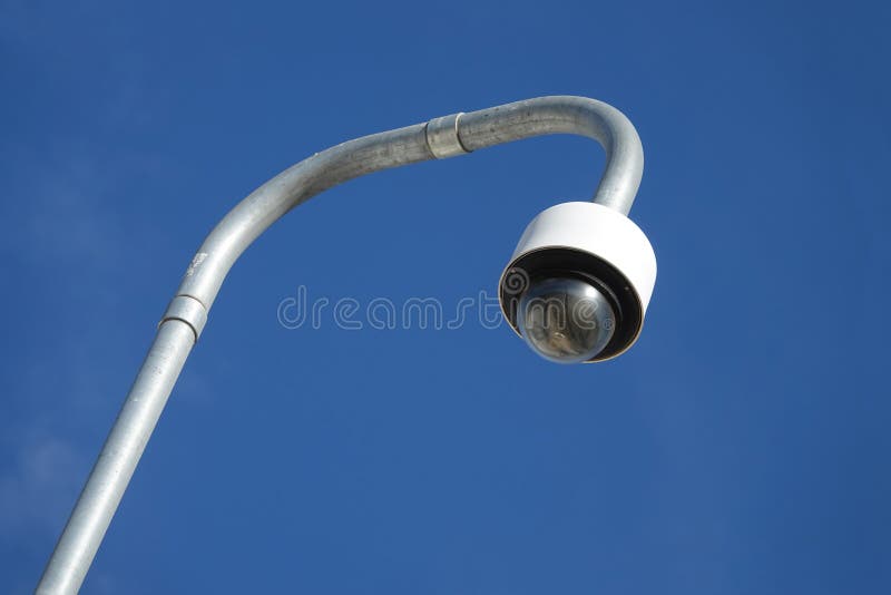 Elevated Dome Security Camera Mounted Overhead on a Metal Pole Stock ...