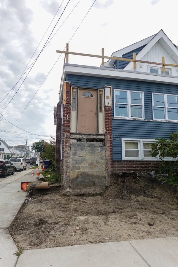 Elevated House Being Renovated with Front Steps Missing Stock Image ...
