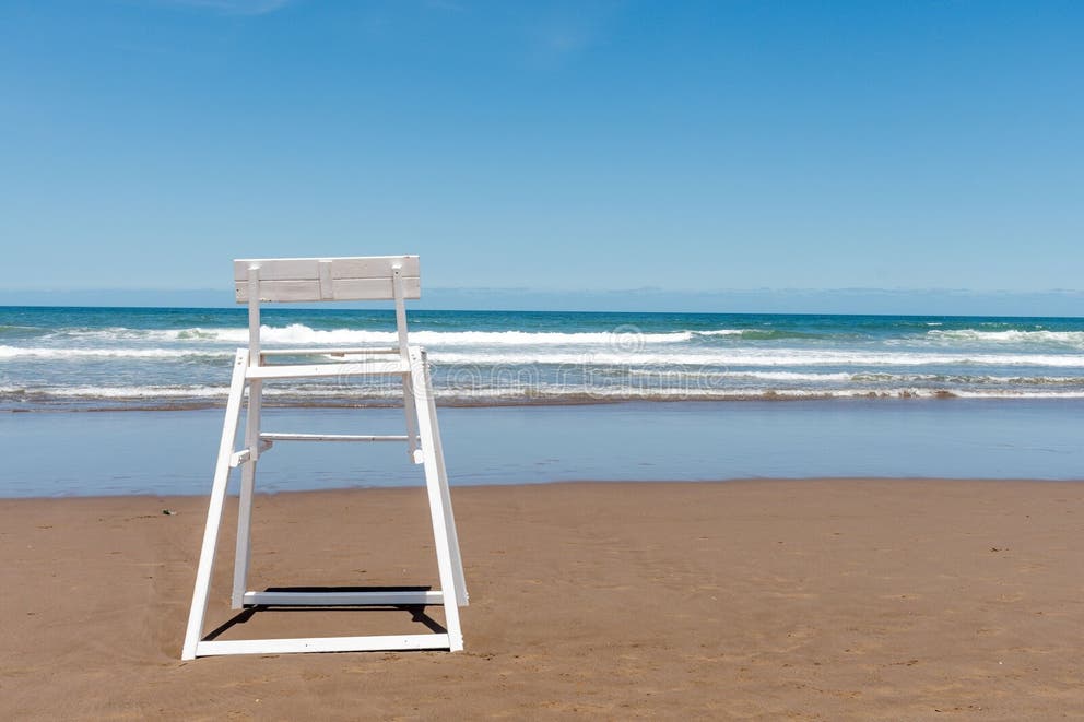 Elevated Lifeguard Chair on an Empty Beach Shore. Stock Image - Image ...