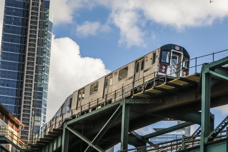 Elevated train in New York stock photo. Image of blue - 203632124