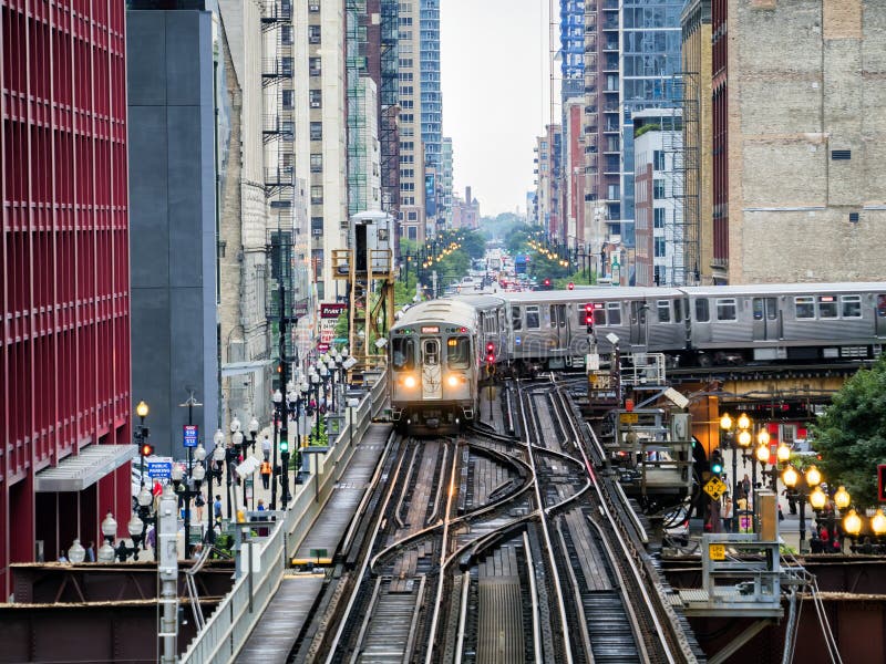 Elevated Train Tracks Above the Streets and between Buildings at the ...