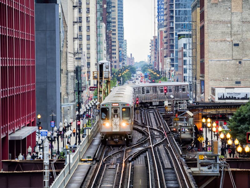 Elevated Train Tracks Above the Streets and between Buildings at the ...