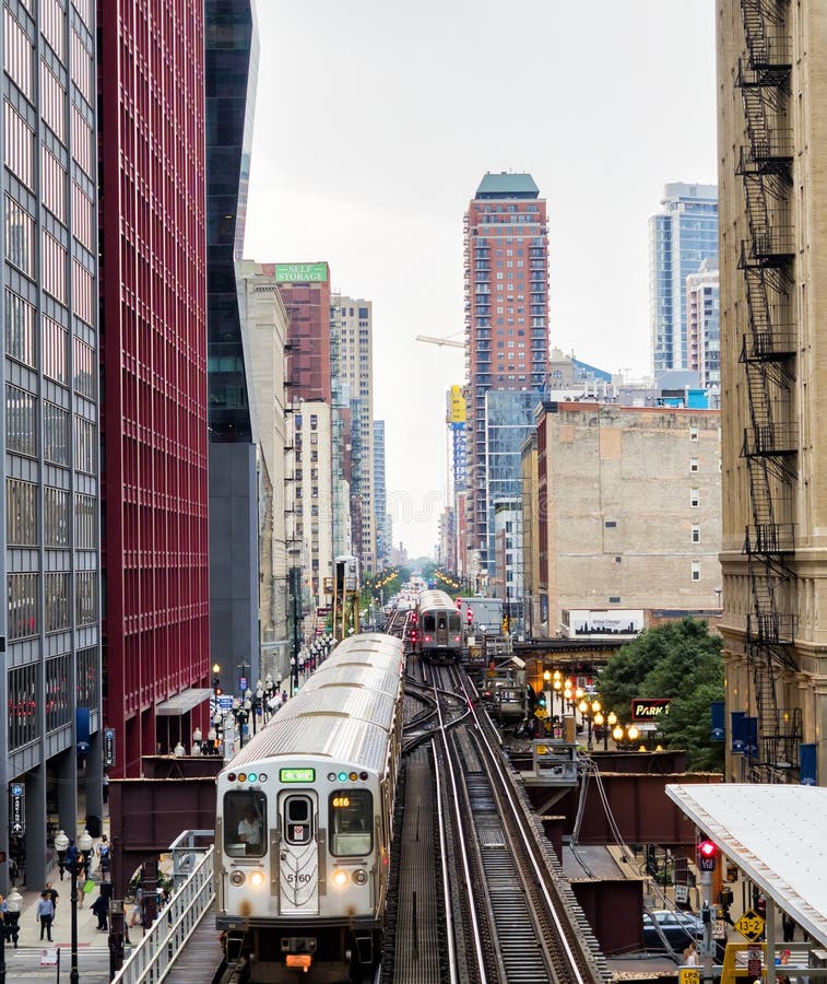 Elevated Train Tracks Above the Streets and between Buildings at the ...