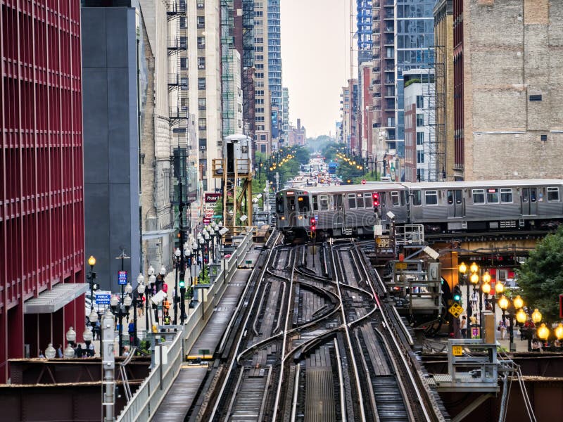 Elevated Train Tracks Above the Streets and between Buildings at the ...