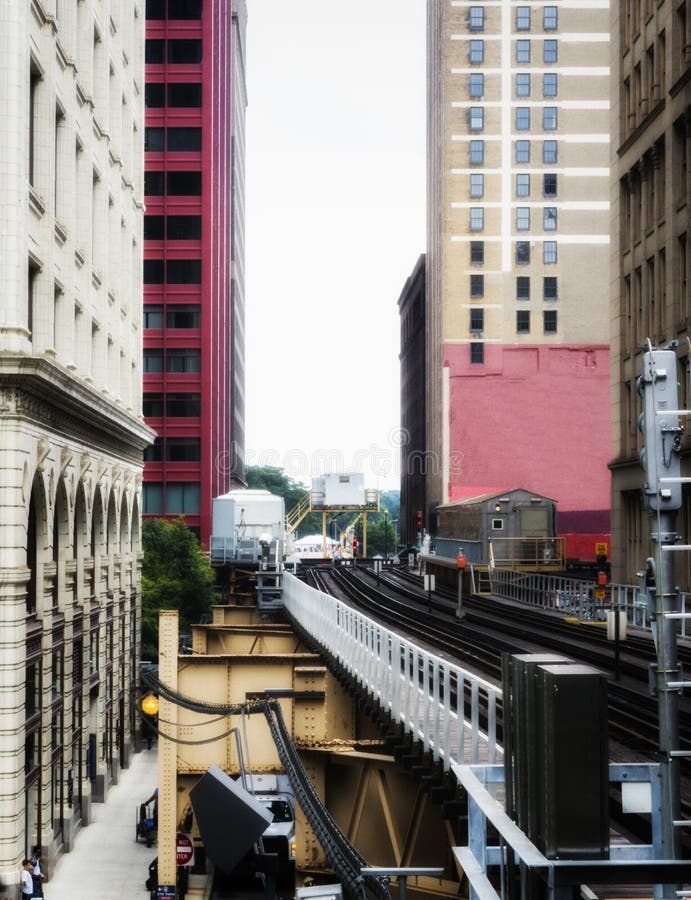Elevated Train Tracks Above the Streets and between Buildings at the ...