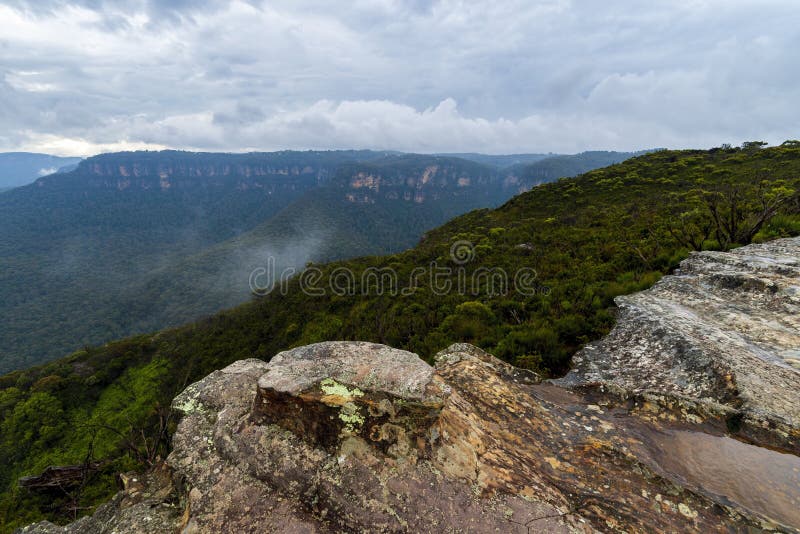Elevated View of Deep Rugged Valley and Rolling Hills from a Rocky ...