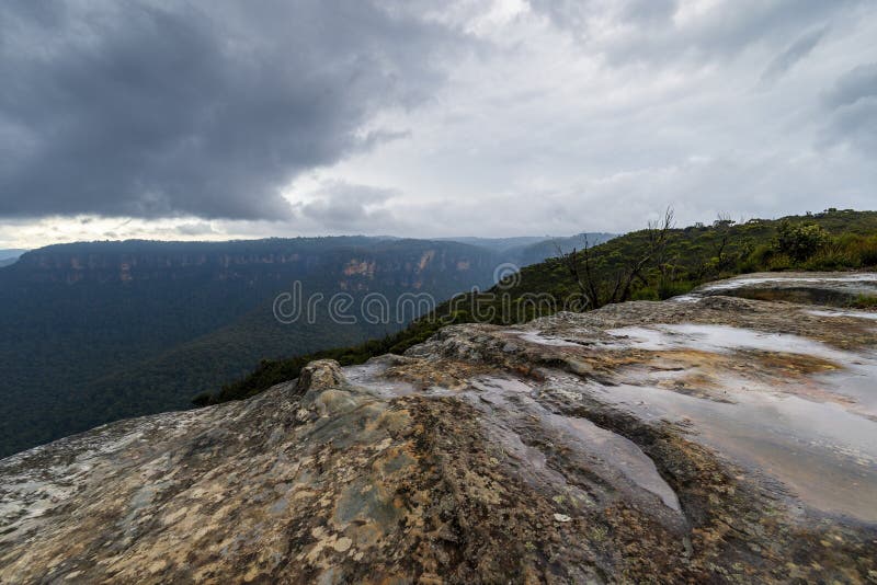 Elevated View of Deep Rugged Valley and Rolling Hills from a Rocky ...