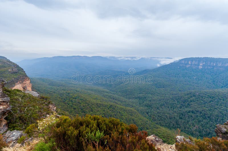 Elevated View of Deep Rugged Valley and Rolling Hills from a Rocky ...