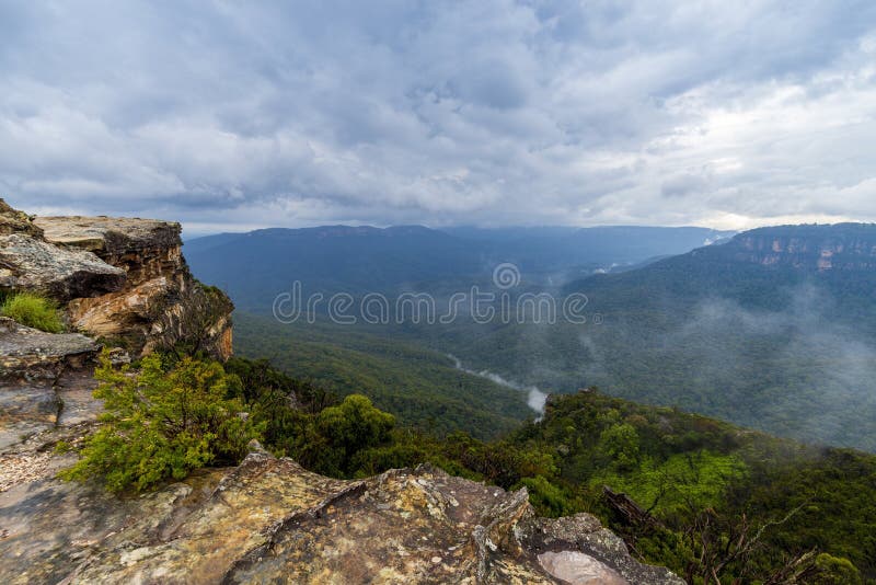 Elevated View of Deep Rugged Valley and Rolling Hills from a Rocky ...