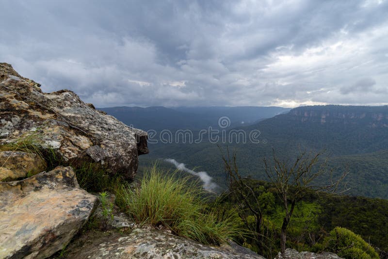 Elevated View of Deep Rugged Valley and Rolling Hills from a Rocky ...