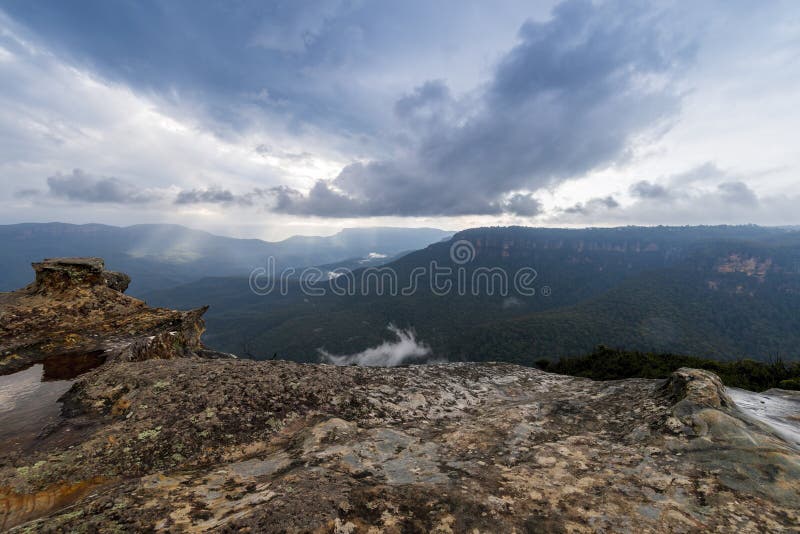 Elevated View of Deep Rugged Valley and Rolling Hills from a Rocky ...