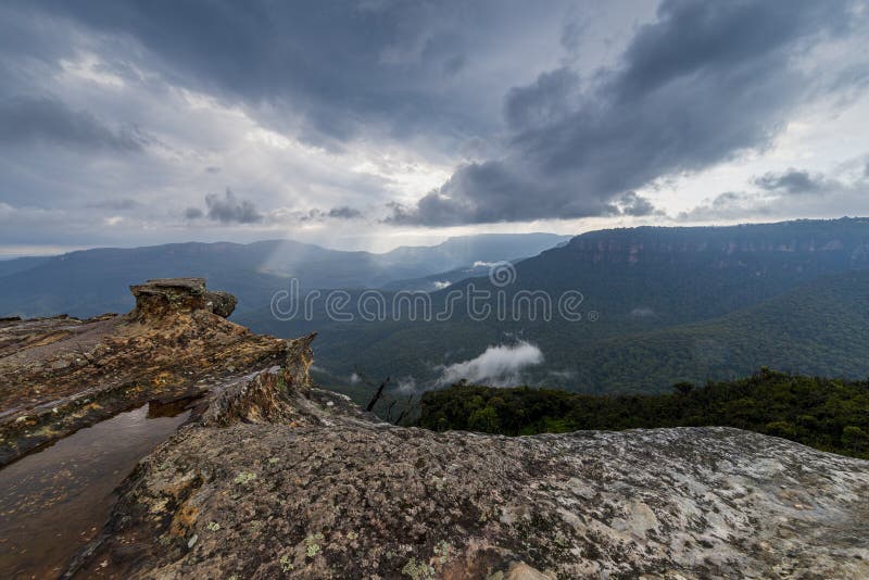 Elevated View of Deep Rugged Valley and Rolling Hills from a Rocky ...