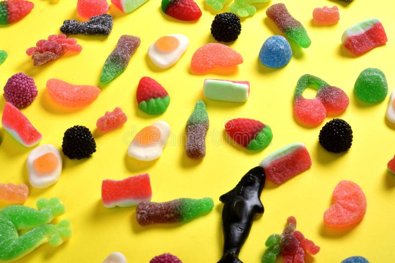 Elevated View of Jelly Candies Collection on Yellow Background Stock ...