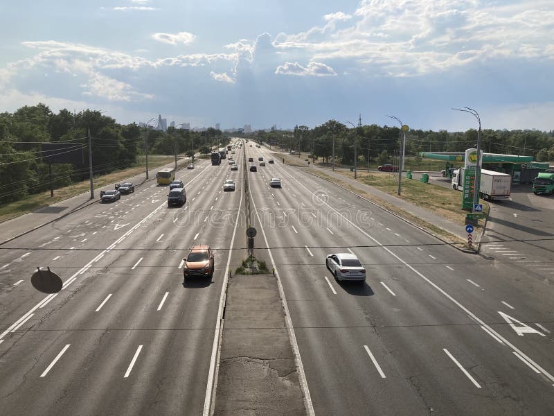 An Elevated View of a Multi-lane Highway with Vehicles, Stretching into ...
