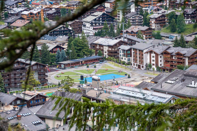 Elevated View of Public Space with Palyground an Alpine Resort. Stock ...