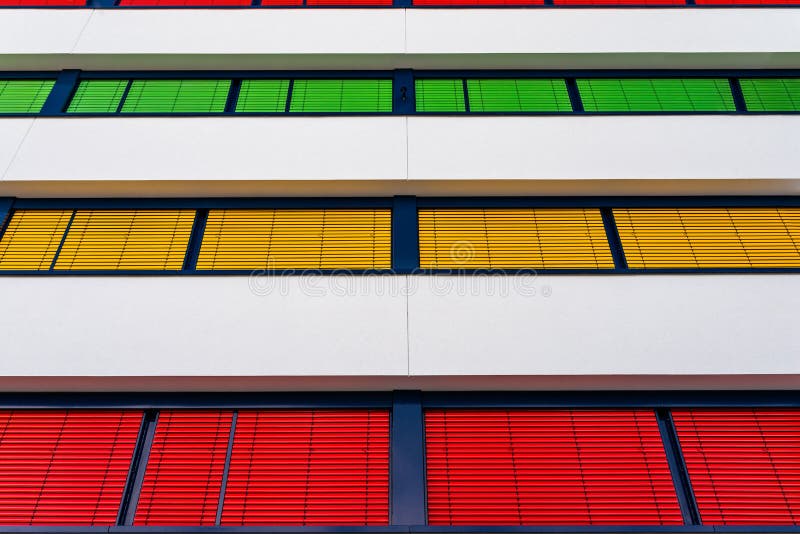Elevation of a Modern Office Building with Different Colors of Blinds ...