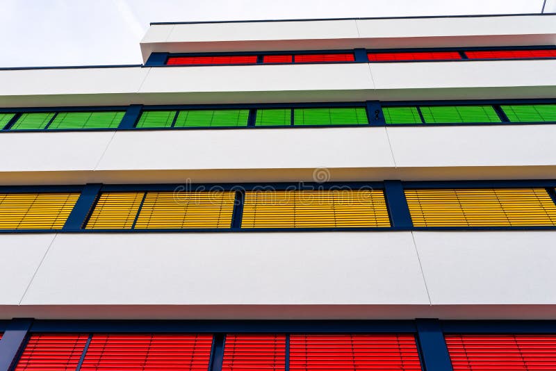 Elevation of a Modern Office Building with Different Colors of Blinds ...