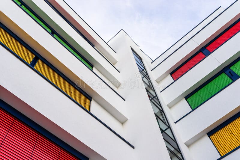 Elevation of a Modern Office Building with Different Colors of Blinds ...