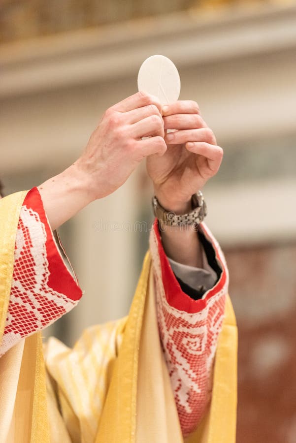 The Holy Bread in the Rite of Eucharist Stock Image - Image of minister ...