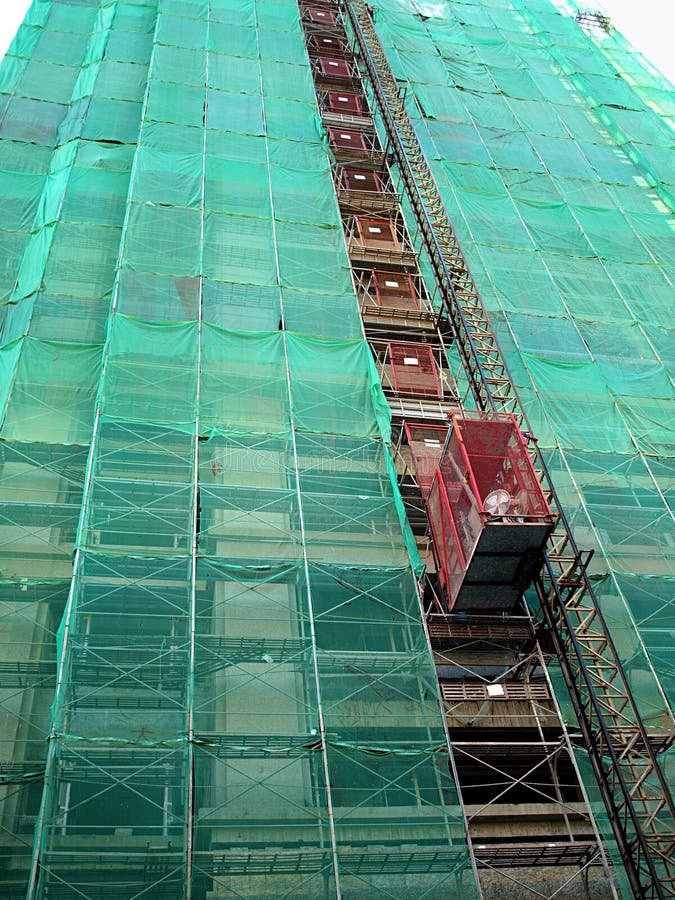 Elevator at Building Construction Stock Photo - Image of girders, cabin ...