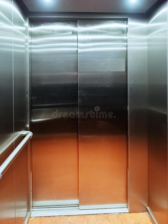 Elevator Cabin with Metal Walls and Doors. Inside View Stock Photo ...