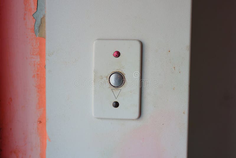 The Elevator Call Button Situated Prominently on the Wall is a Crucial ...