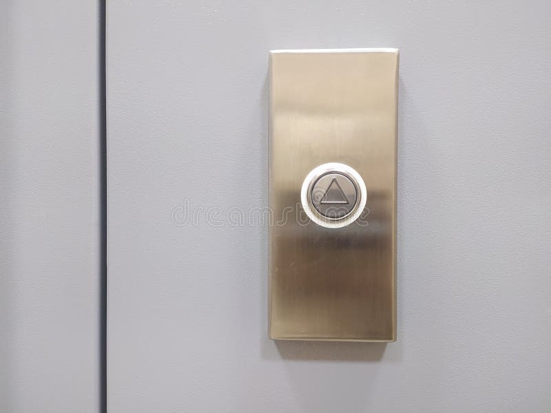 Elevator Call Button with Up Arrow on Grey Wall Stock Photo - Image of ...