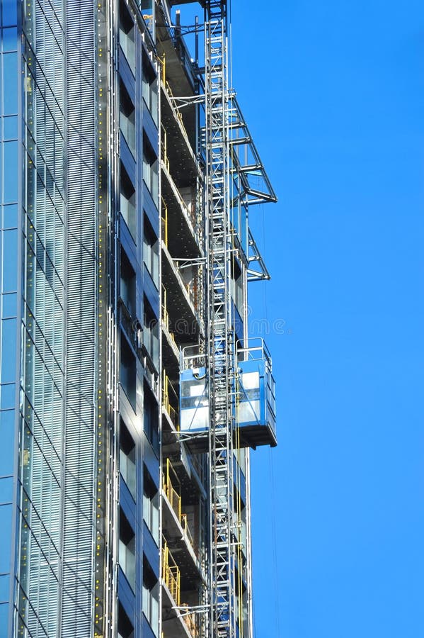 Elevator on Construction Site Stock Image - Image of build, cement ...