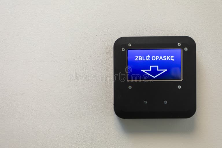 Elevator Control Panel that Features a Down Arrow Indicator for User ...