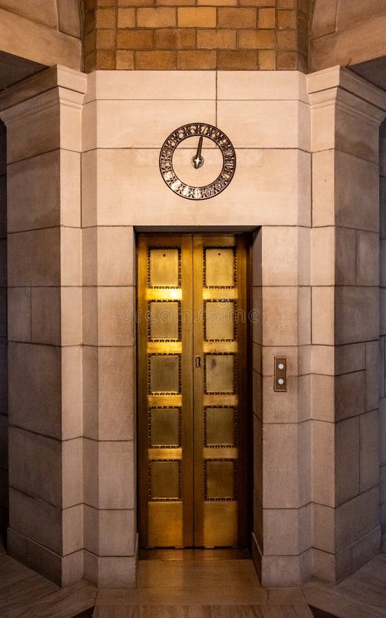 Elevator Door and Clock Dial in Nebraska State Capitol Editorial ...